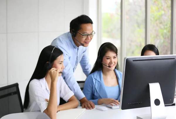 operator customer service in the office, Technical support operator with headset working at ...