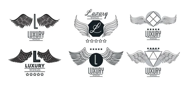 Luxury wings emblem Stock Vector Image by ©jemastock #209957736