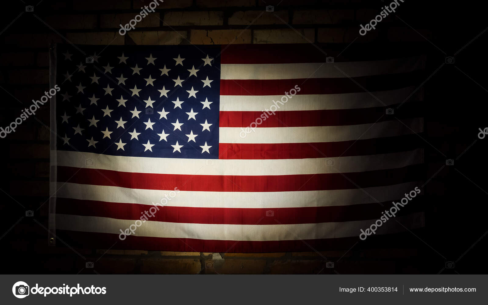 U.S. flag in the dark illuminated by spotlight — Stock Photo ...
