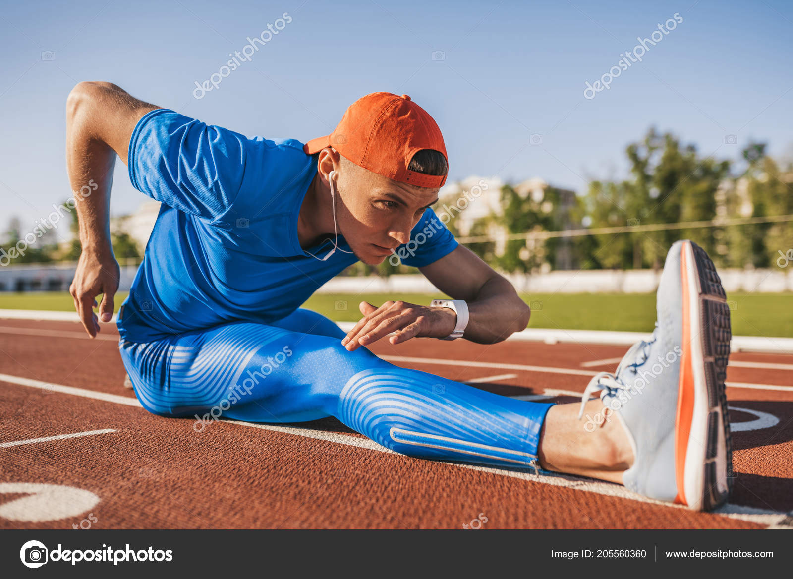 Horizontal Shot Athlete Runner Young Male Stretching His Leg Running ...