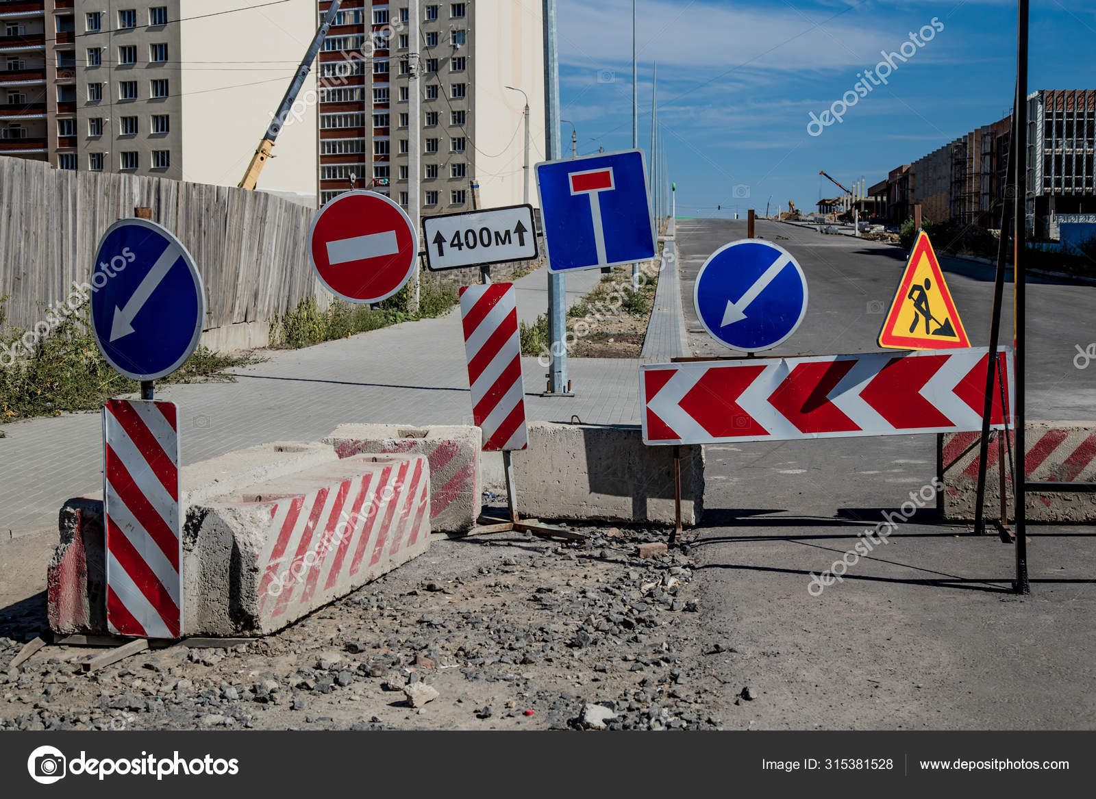Work in progress. Roadworks, road signs. Men at work. Some signs ...