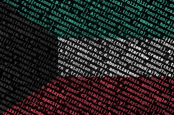 Kuwait flag is depicted on the screen with the program code. The ...