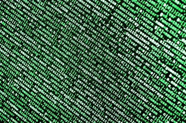 Writing programming code on laptop. Digital binary data on computer screen. Project managers ...