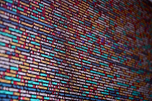 Software developer programming code on computer. Abstract computer script source code. Shallow ...