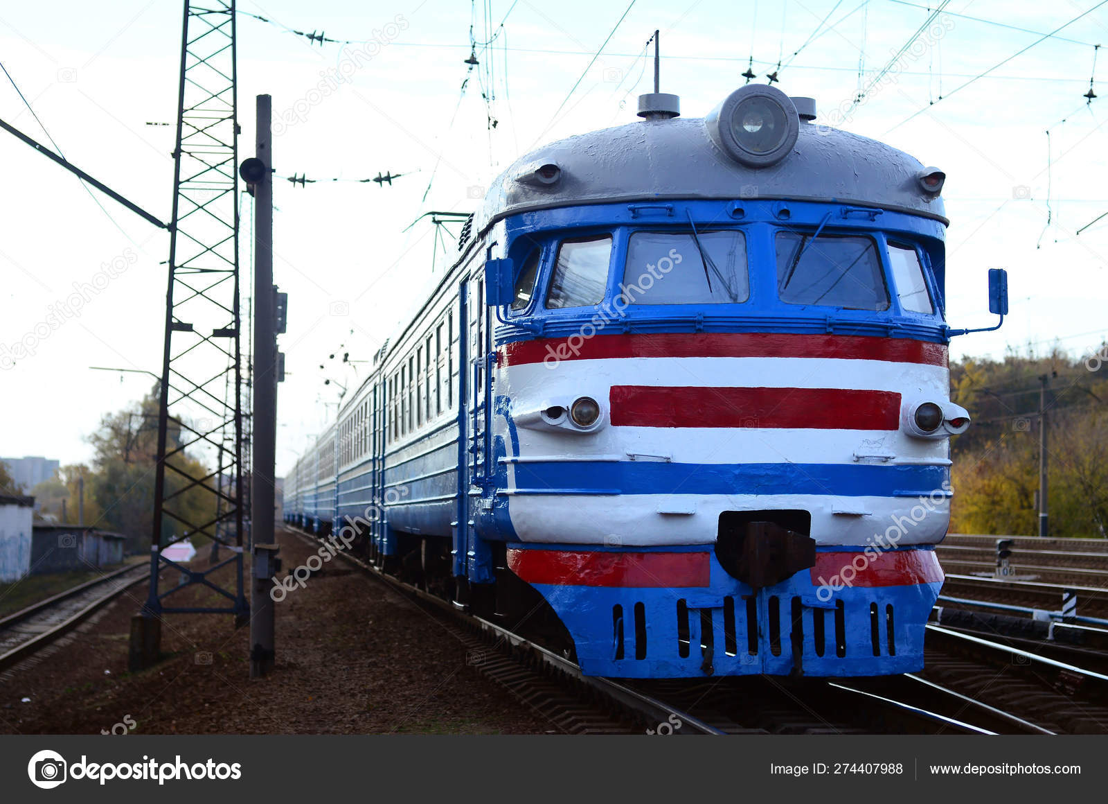 Old soviet electric train with outdated design moving by rail — Stock ...