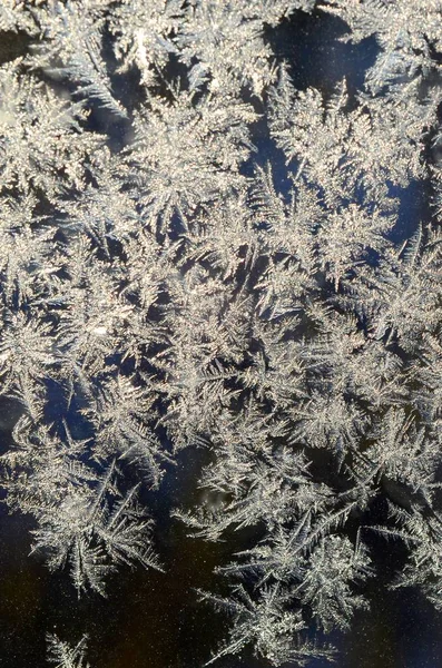 Snowflakes frost rime macro on window glass pane - Stock Image - Everypixel