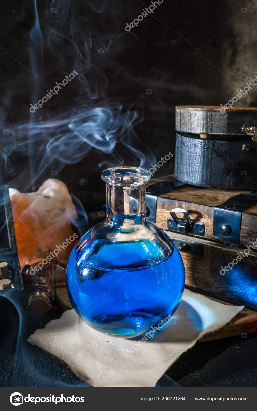Magic concept. Blue potion in glass bottle Stock Photo by ©Angelus_Liam ...