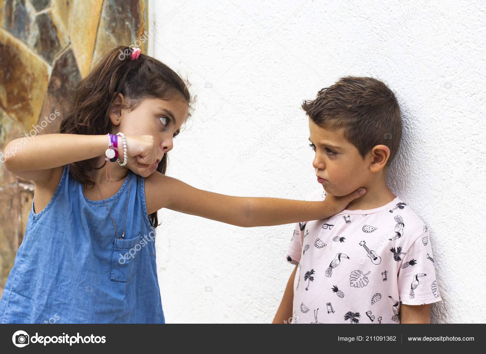 Little Kid Hitting Another Child Bullying Concept Stock Photo by ...