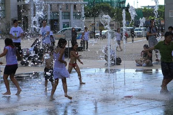 Group of cute kids spitting water outdoors Stock Photos, Royalty Free ...