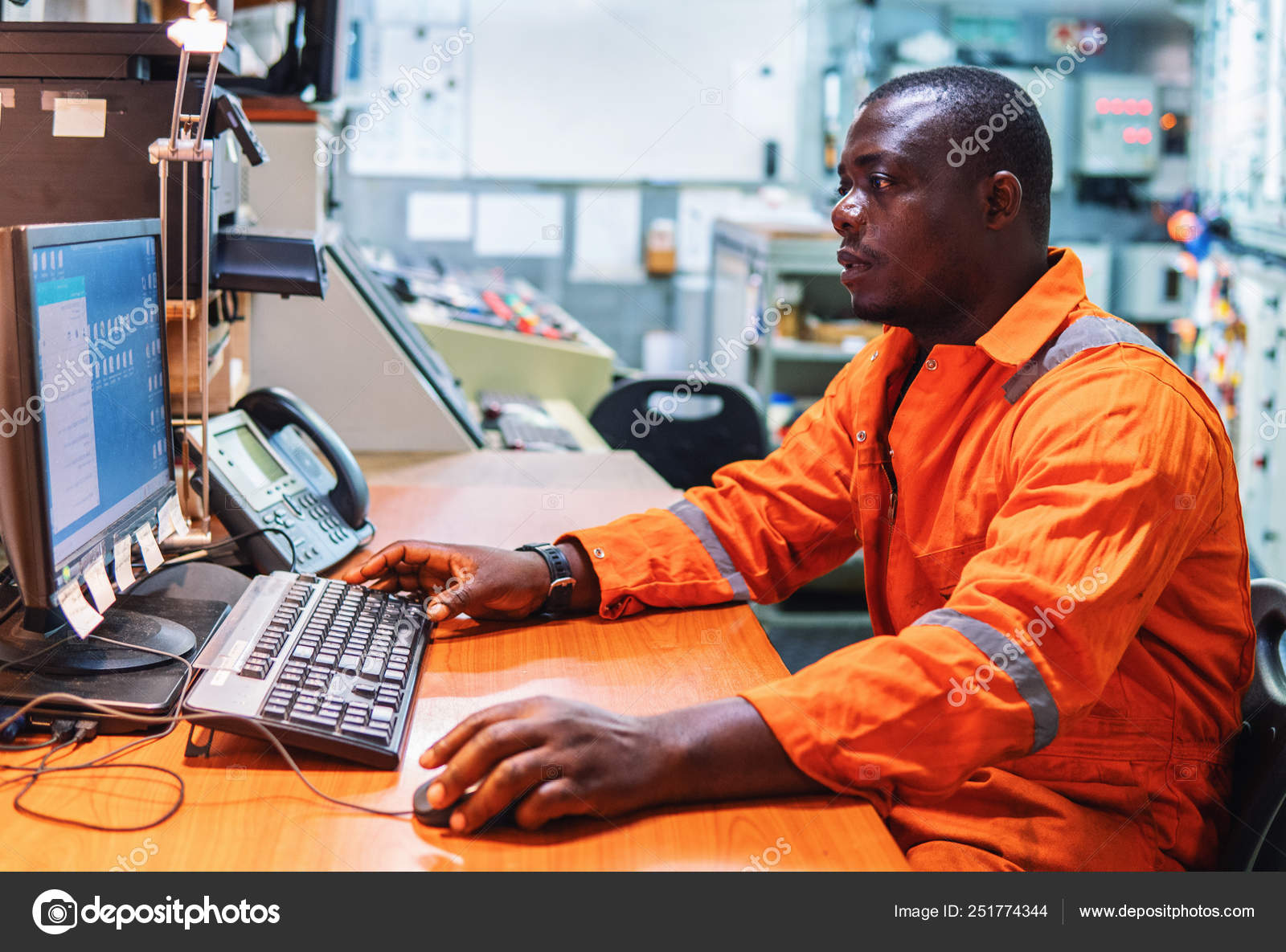 Marine engineer officer working in engine room — Stock Photo © igor ...