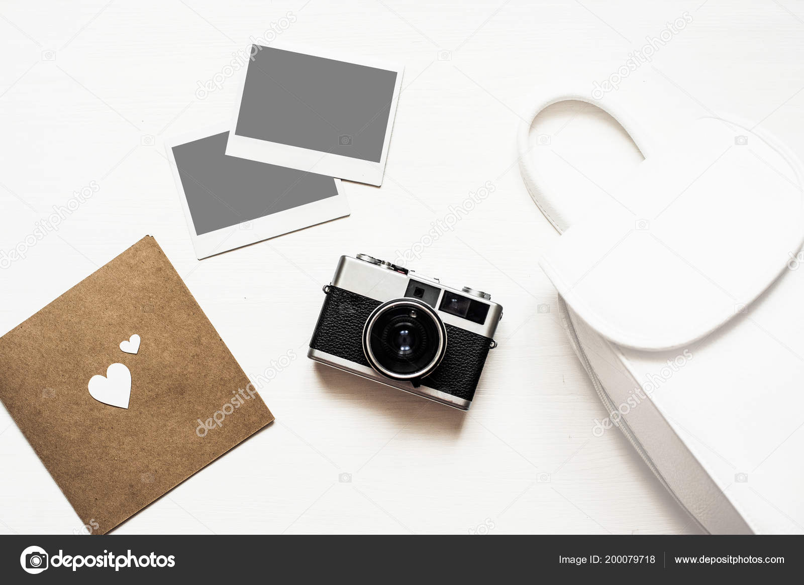 Flatlay vintage retro camera on wooden white background with empty ...