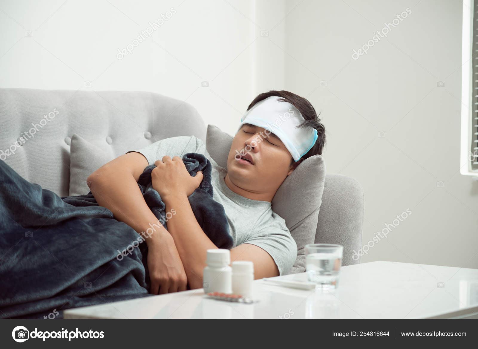 Sick Wasted Man Lying Sofa Suffering Cold Winter Flu Virus Stock Photo ...