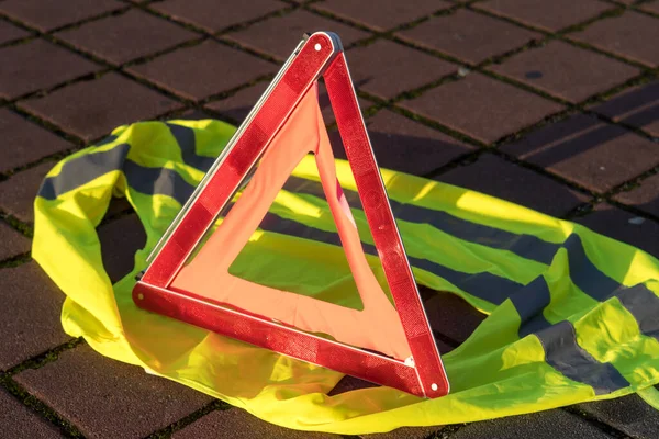 Red Triangle Warning Sign Yellow Safety Vest Stock Photo by ©info ...
