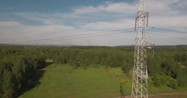 Top view, AERIAL: power lines. Electric high-voltage supports ...
