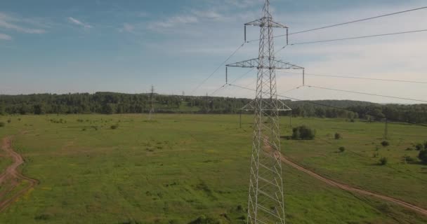 Top view, AERIAL: power lines. Electric high-voltage supports ...