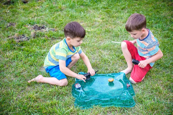Kids playing bucket Stock Photos, Royalty Free Kids playing bucket ...