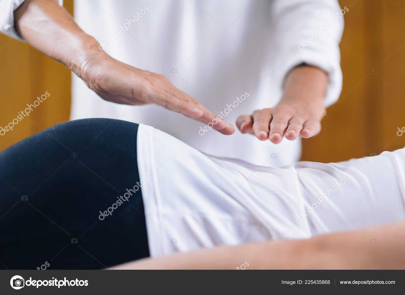 Horizontal Image Female Reiki Therapist Holding Hands Teenage Patient ...