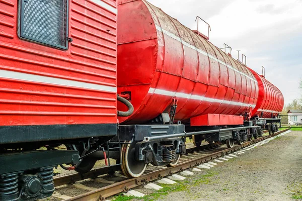 Red fire train on the track. Stock Photo by ©4-s.ukr.net 257419968