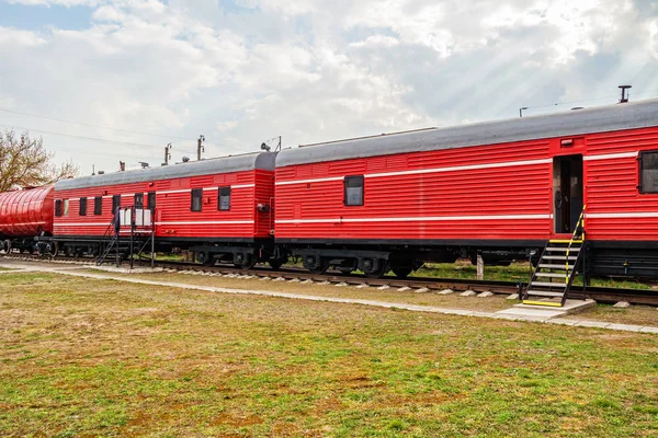 Red fire train on the track. Stock Photo by ©4-s.ukr.net 257419968