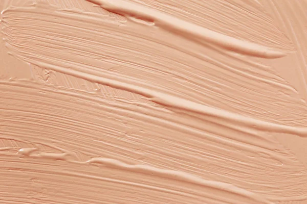 Beige texture of the liquid base, background - Stock Image - Everypixel