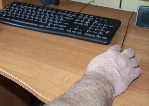 An elderly person, a pensioner, a disabled person using a computer ...