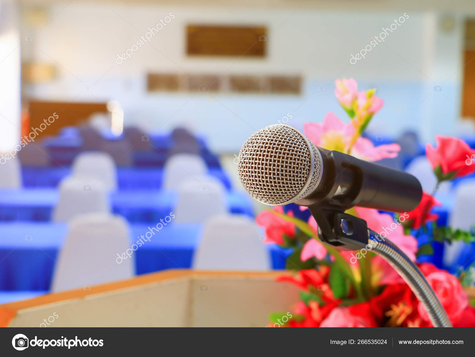 Microphone wireless on stand and flower in meeting room — Stock Photo ...