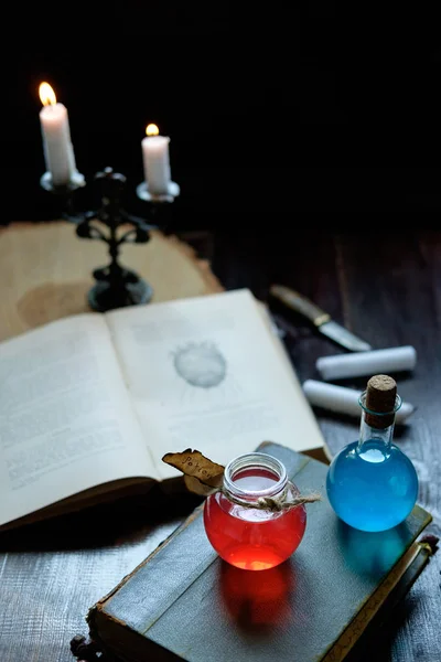 Magic and wizardry concept. Set of sorcery book, magic potions and ...