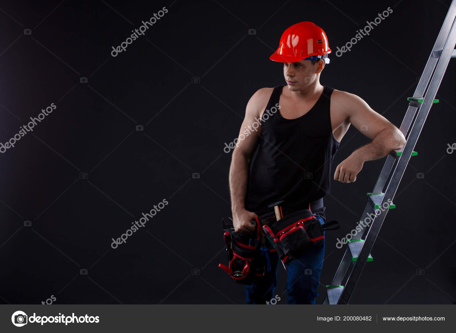 Worker Leans Ladder Looks Black Background Helmeted Athlete Stock Photo ...