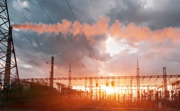 High power electricity poles in urban area. Energy supply, distribution ...