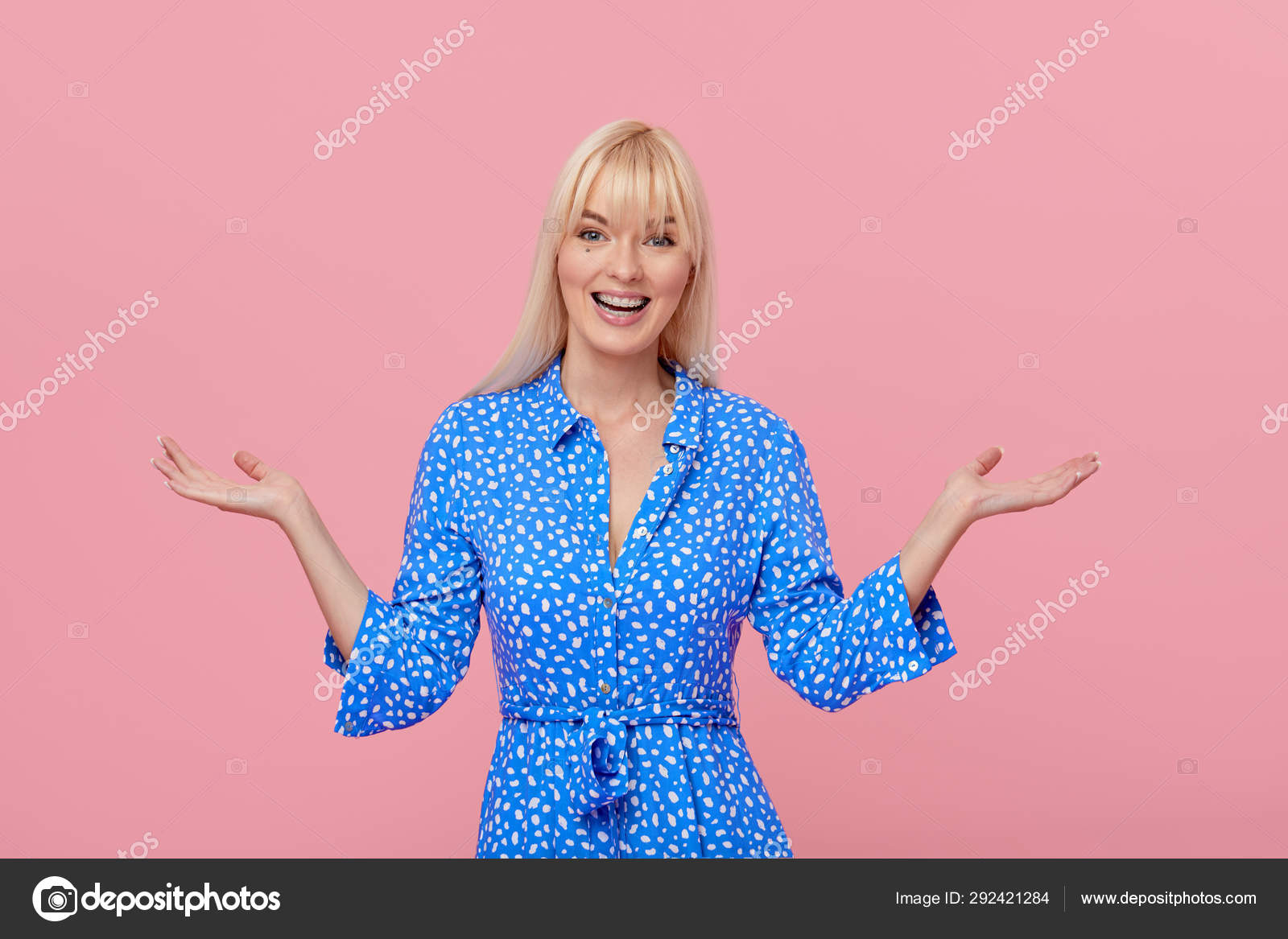 Woman Surprise Showing Product Beautiful Girl Blond Hair Braces