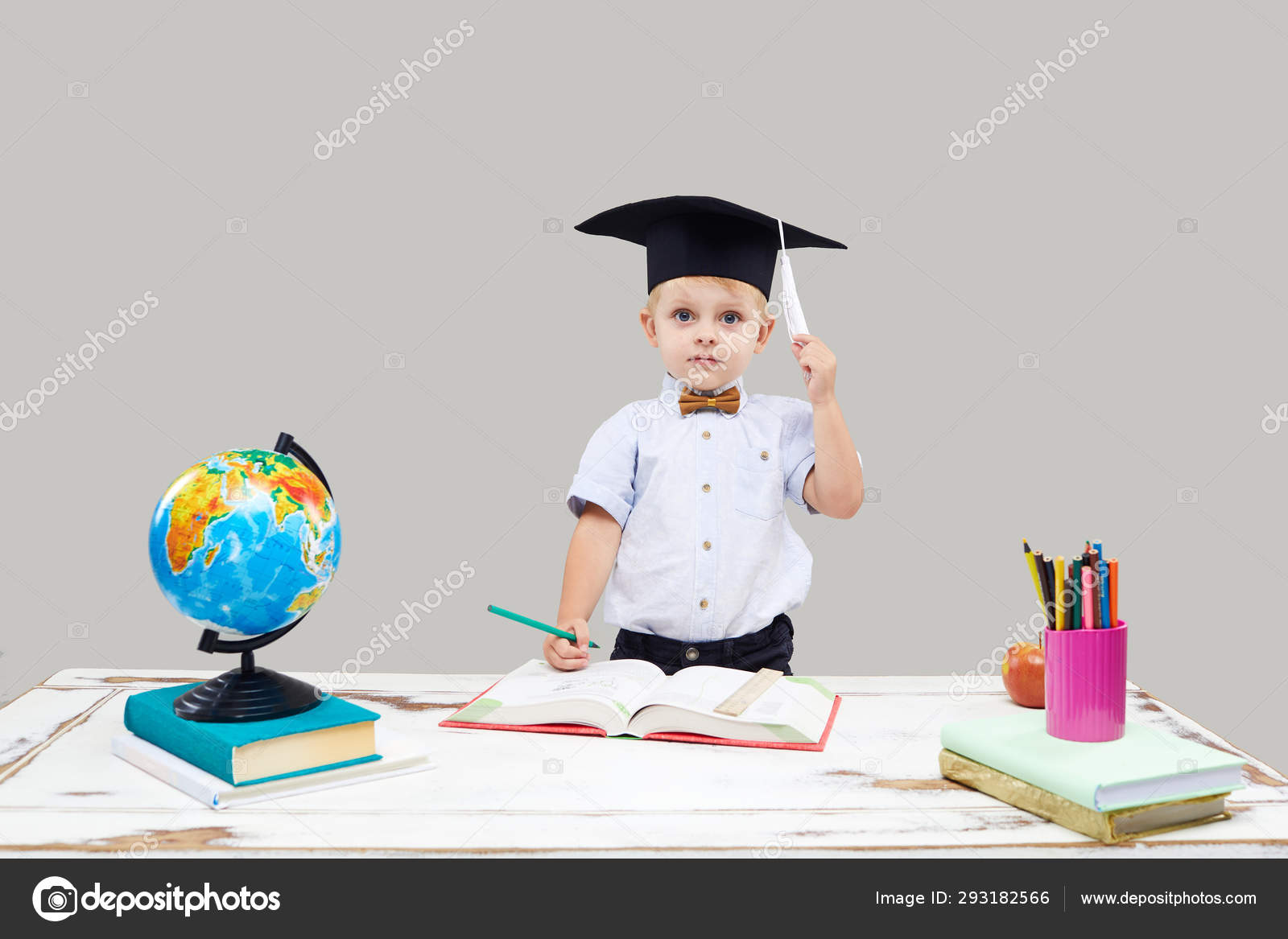 Clever Smart Child Prodigy Little Boy Graduation Cap Studying Geography ...