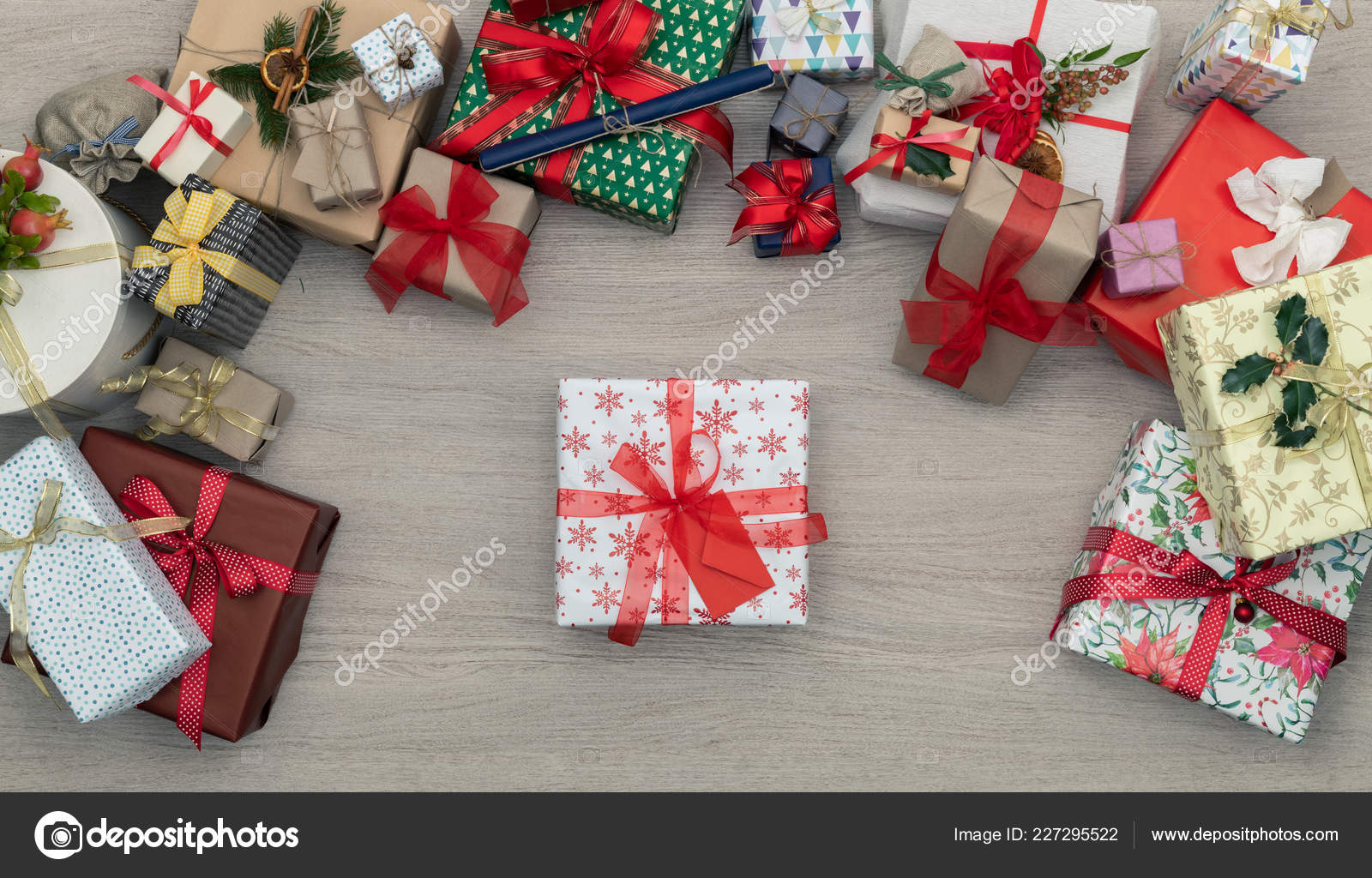 Gift present box in vertical top view wooden table full of christmas or ...