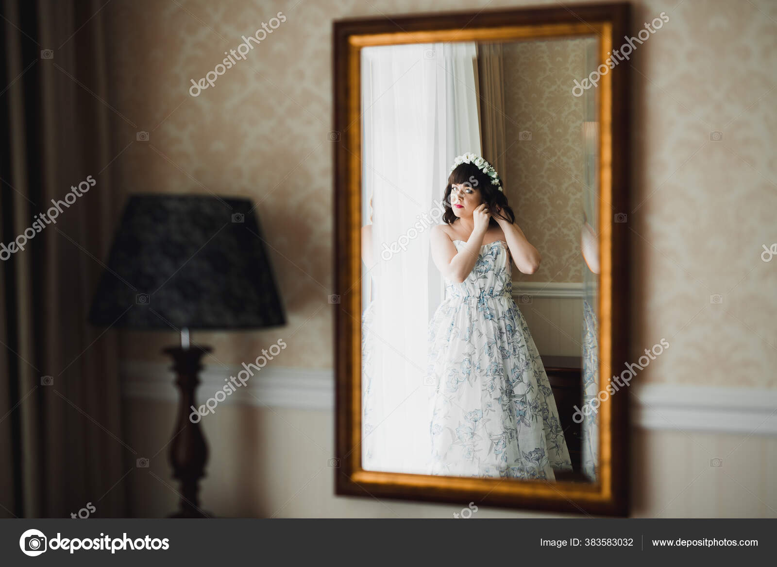 Beautiful bride wearing fashion wedding dress with feathers with luxury ...