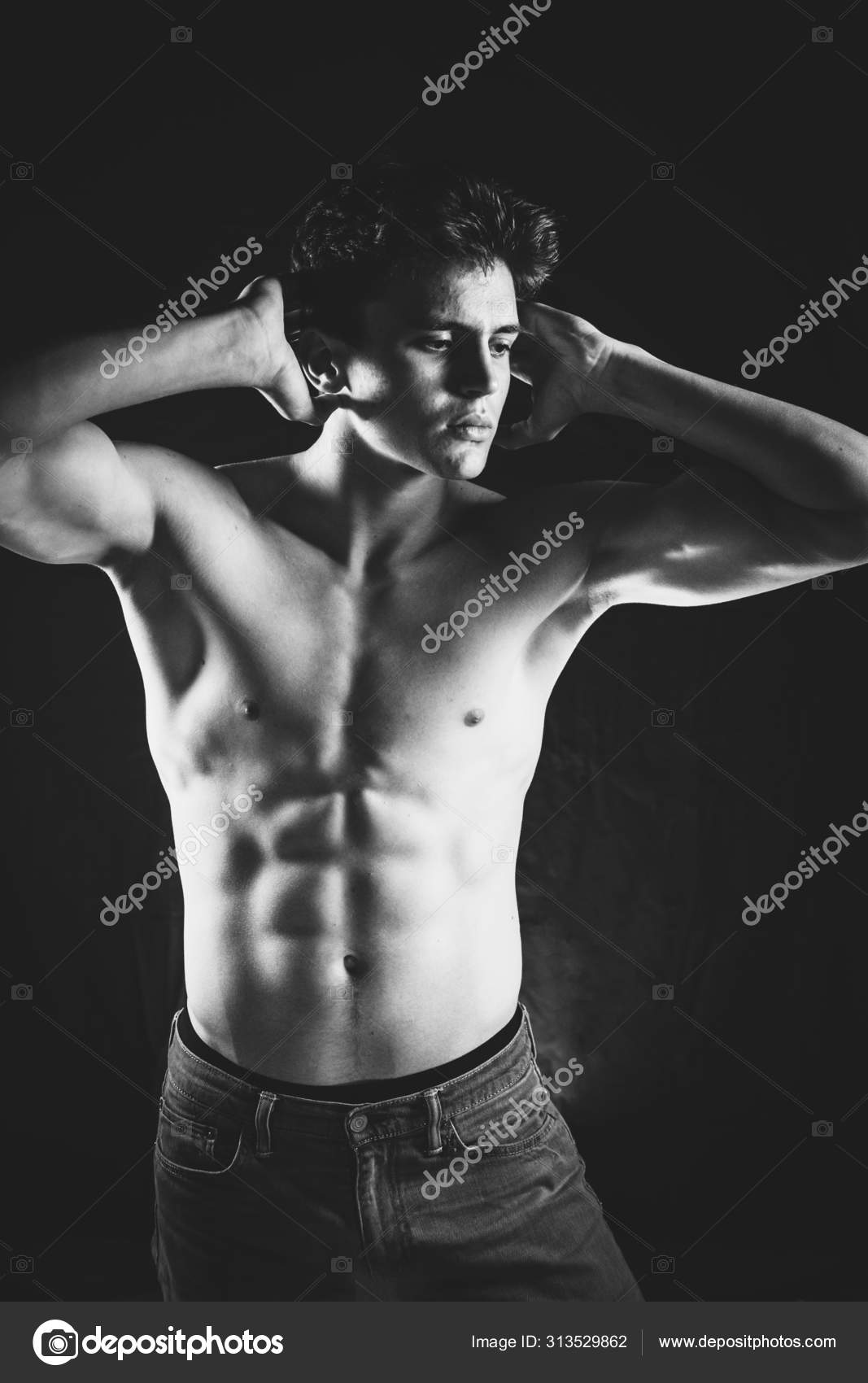 Sexy stylish strong sensual muscular young macho man with bare t Stock ...