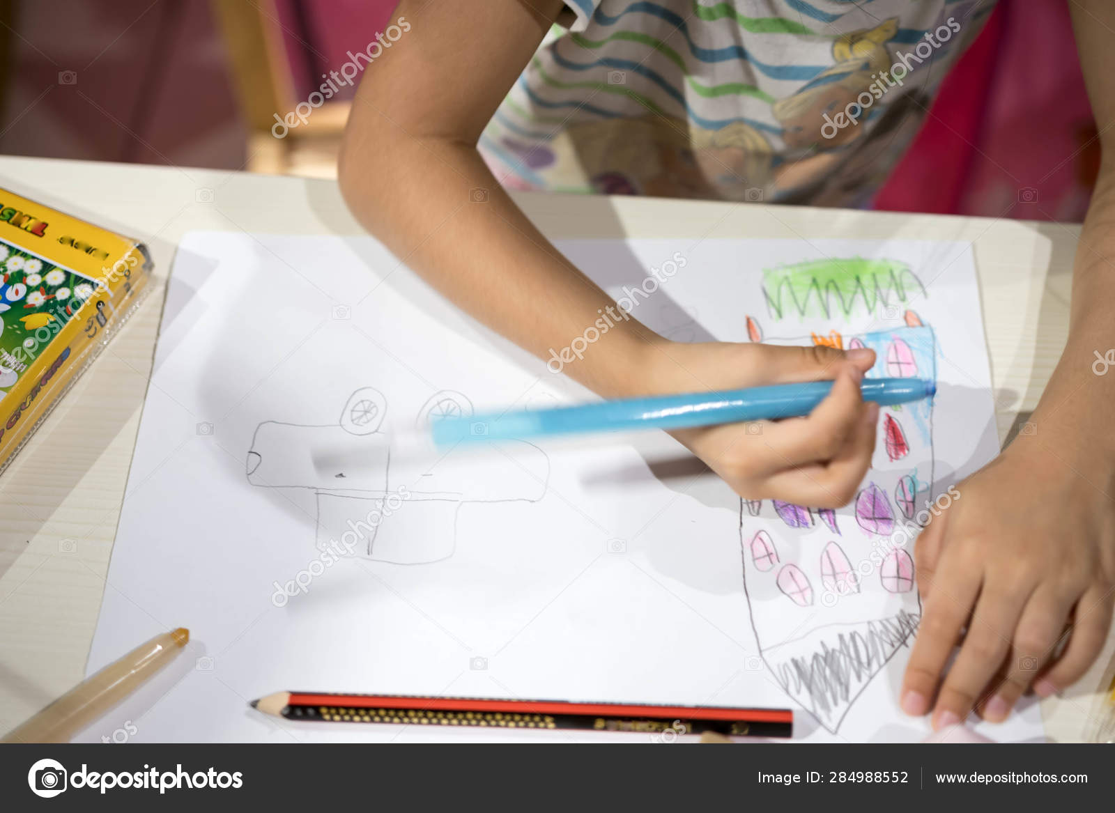 Child writing drawing coloring on paper using crayon — Stock Photo ...