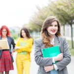 Smiling Student Posing Books University Campus Stock Photo by ©hsfelix ...