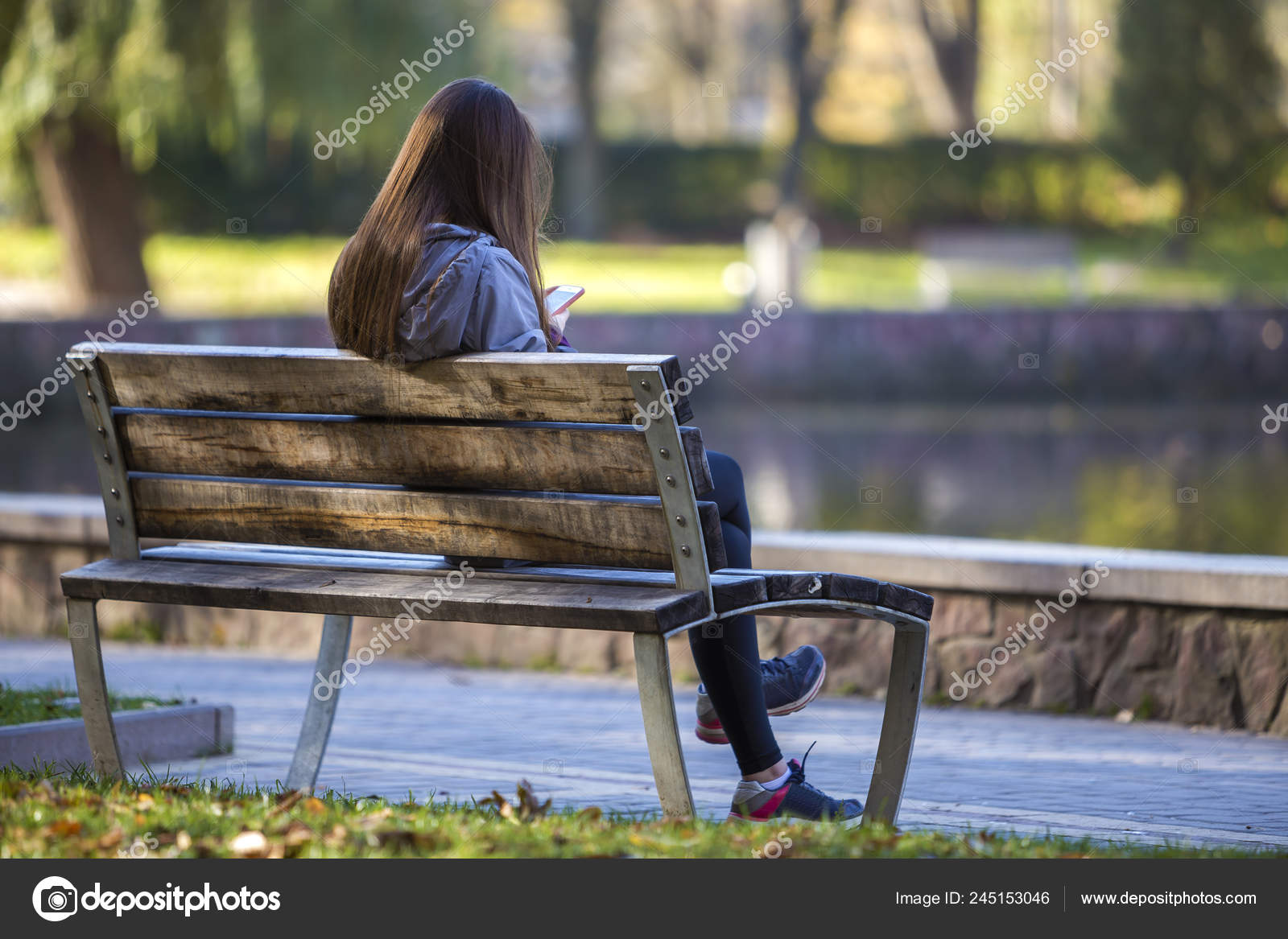 Woman Sitting On Bench Back View Couple Bench Back View Hi Res Stock