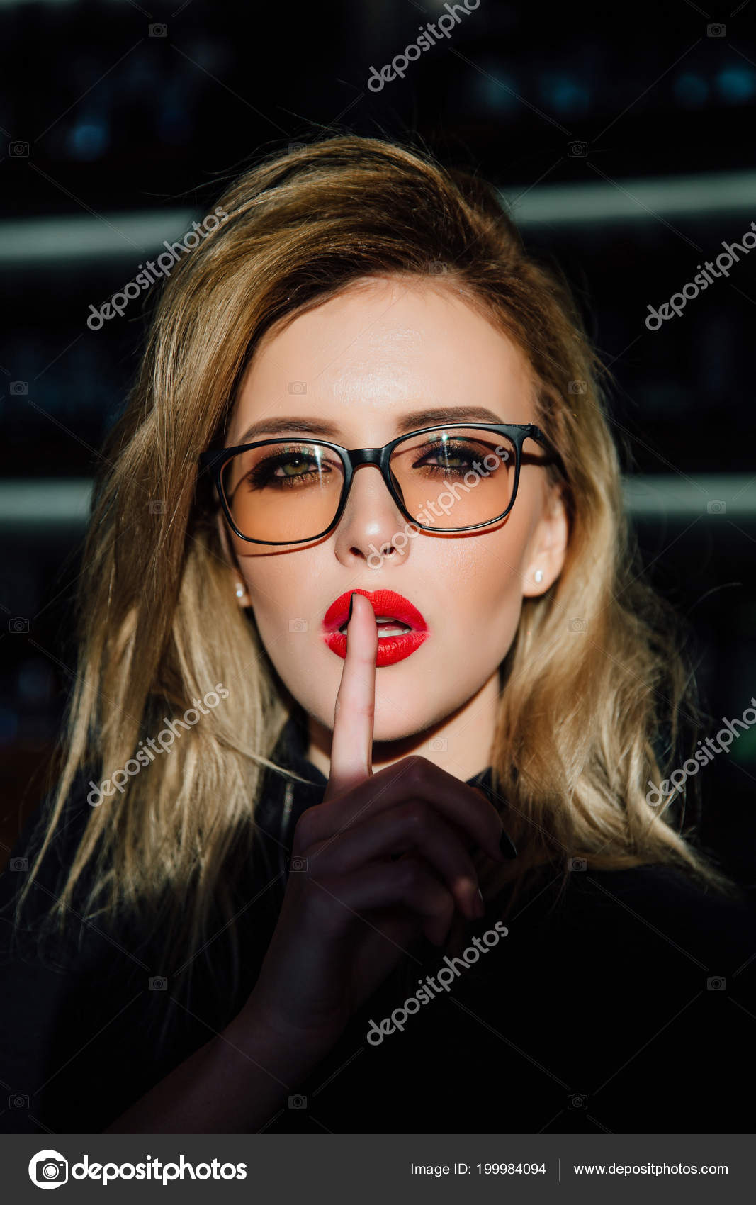 Hush Woman In Glasses Ask For Silence Or Secrecy With Finger On Red
