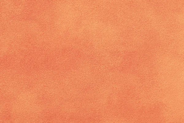 Orange matte background of suede fabric, closeup. Velvet texture of ...