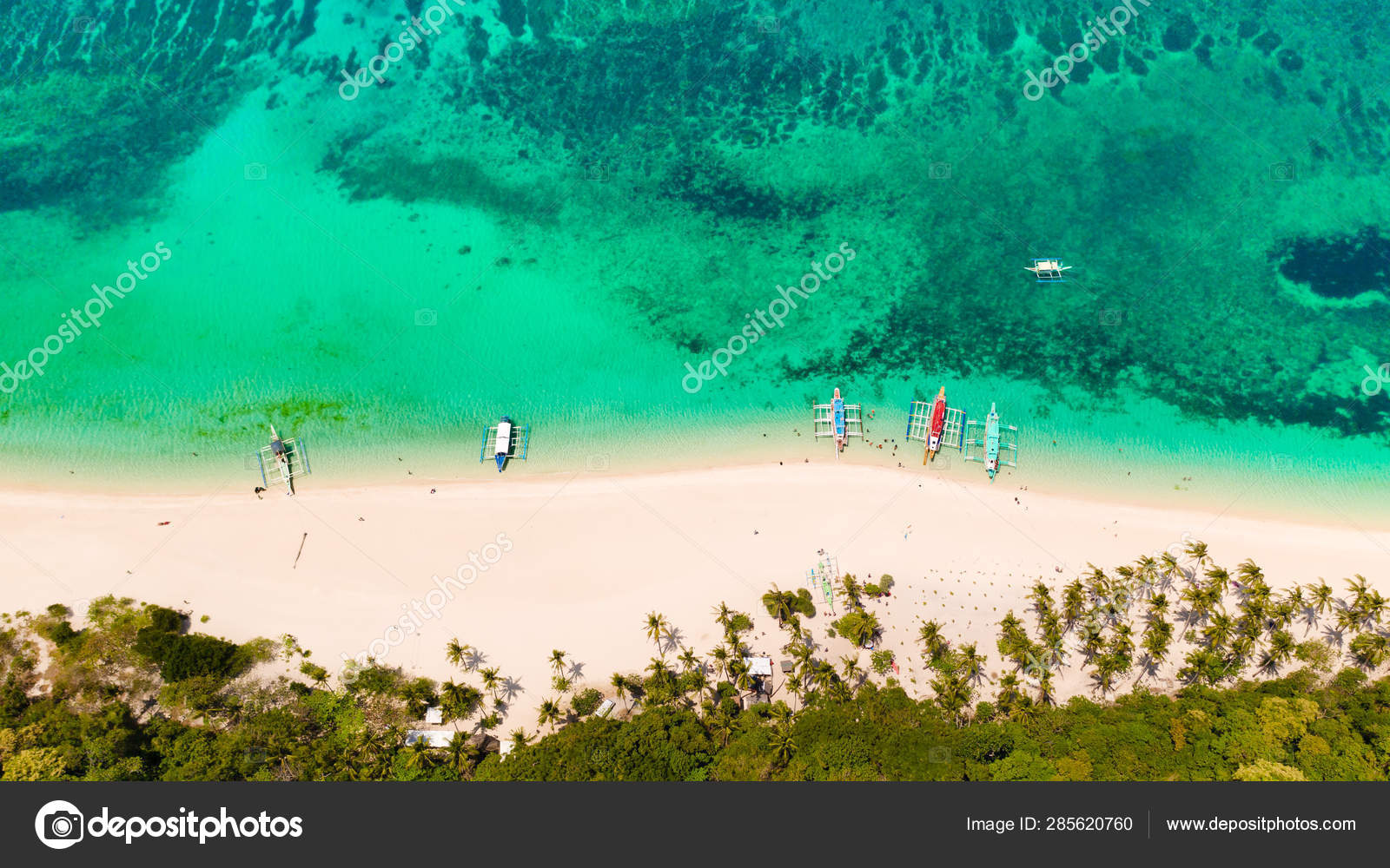 Turquoise lagoon with a coral reef and white beach. Beach with white ...