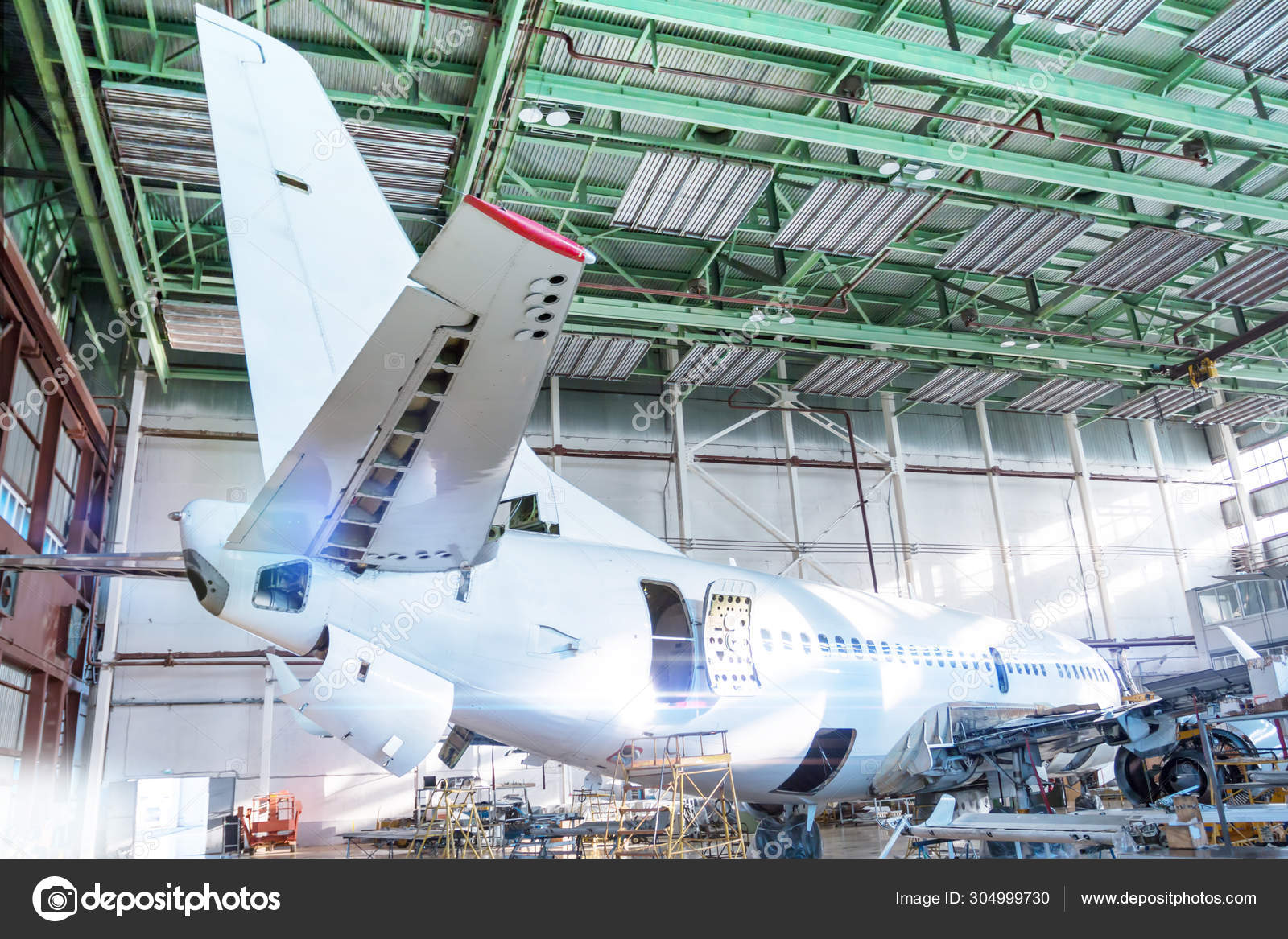 Passenger Aircraft Maintenance Hangar Checking Mechanical Systems ...