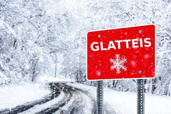 Warning traffic sign on a ice road. Glatteis is the german word for ...