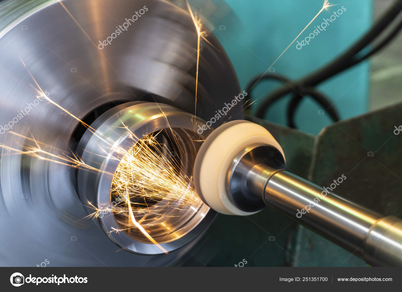 End processing of a metal surface with an abrasive stone on a circular ...