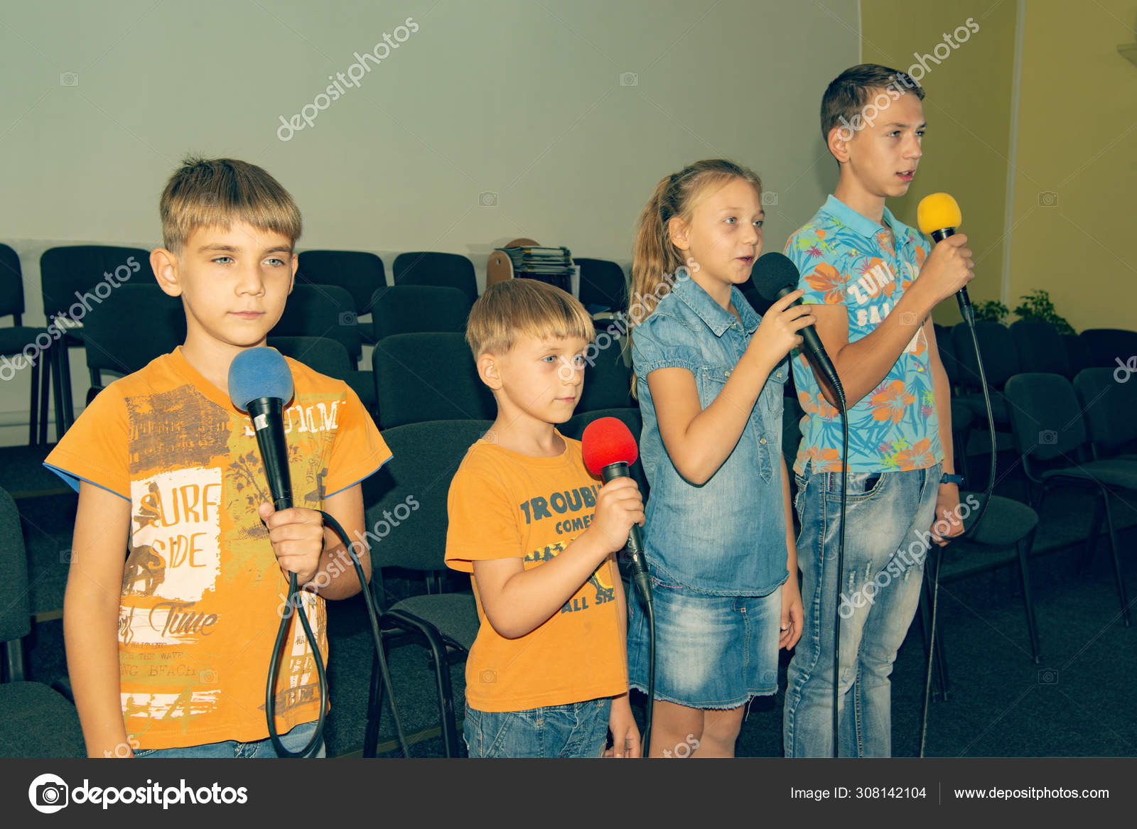 Children participate with a microphone, recite poems, recitation, sing ...