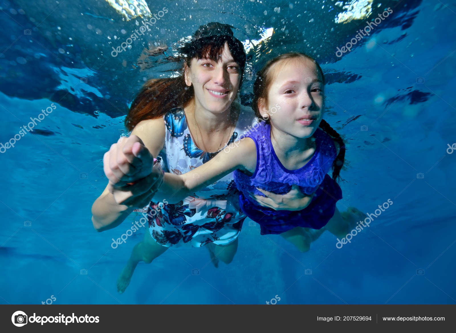 Mom Daughter Swim Underwater Pool Beautiful Dresses Mom Helps Daughter ...