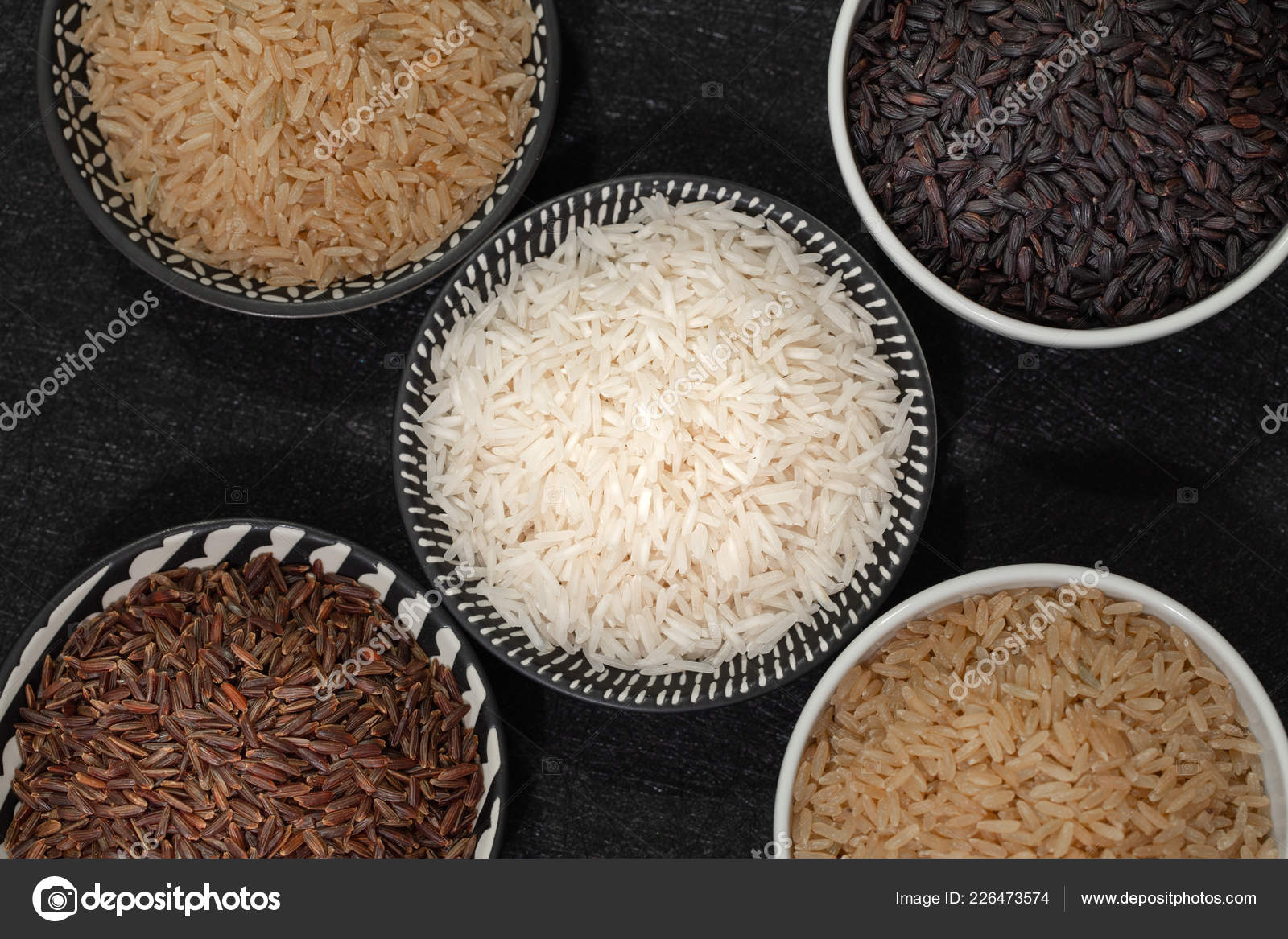 Different Varieties Raw Rice Stock Photo by ©rochu_2008 226473574