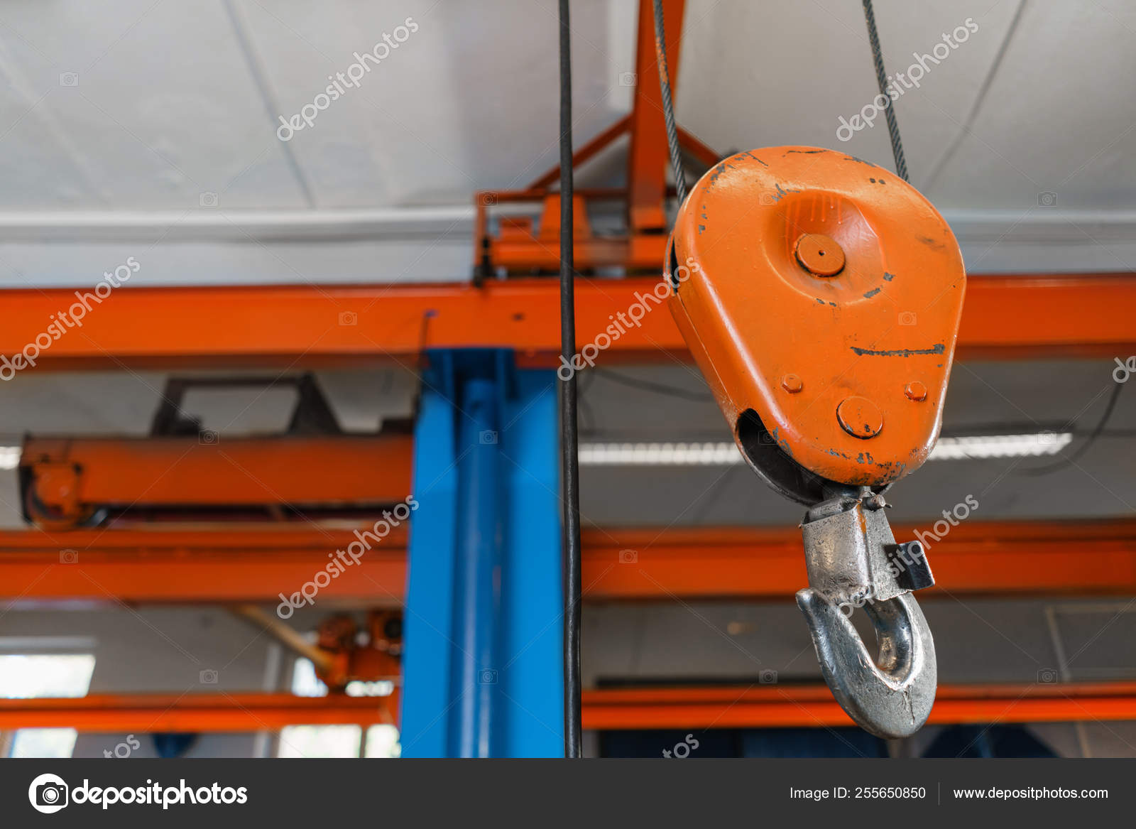 Crane hook. The system of pulleys and ropes, a hanging mechanism in the ...