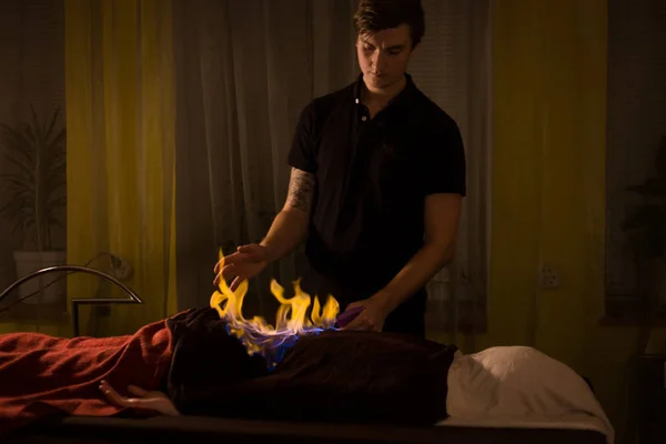 Chinese fire massage and therapy - Stock Image - Everypixel