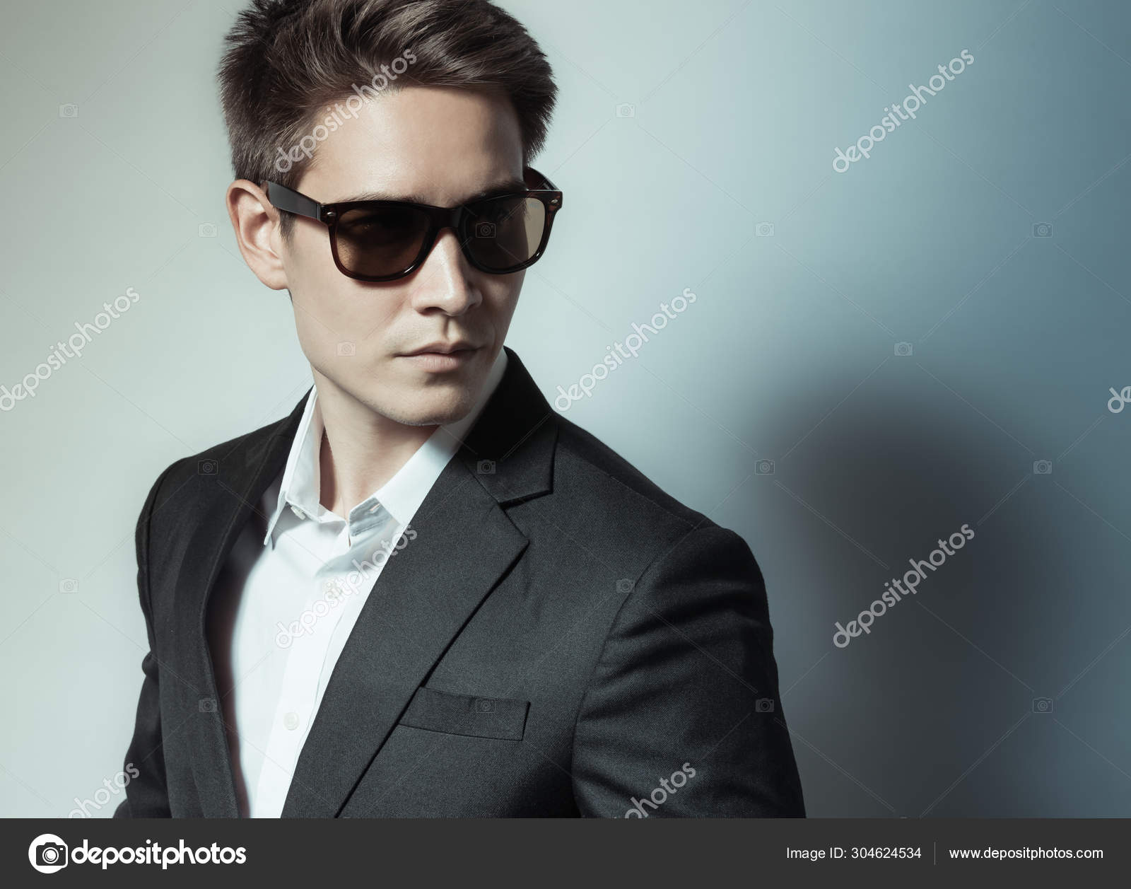 Handsome Man Wearing Suit Stock Photo by ©kieferpix 304624534