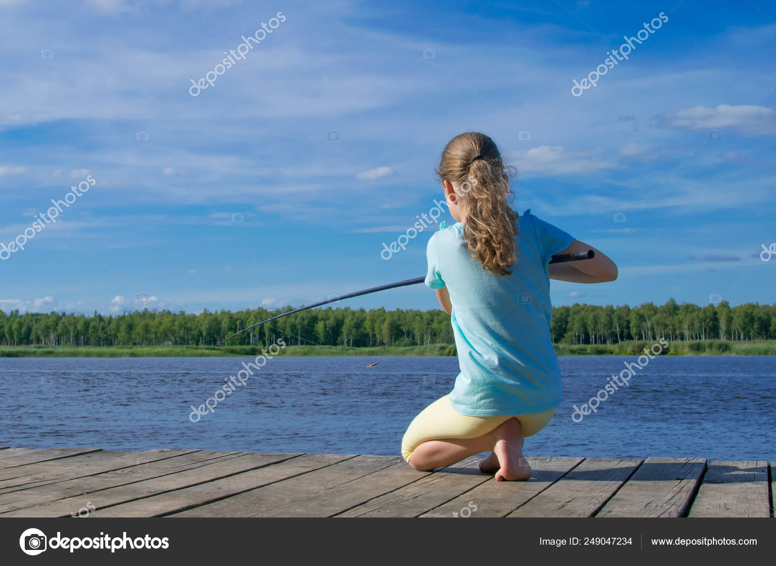 Girl Pier Sitting His Haunches Holding Rod Background Water Catches ...